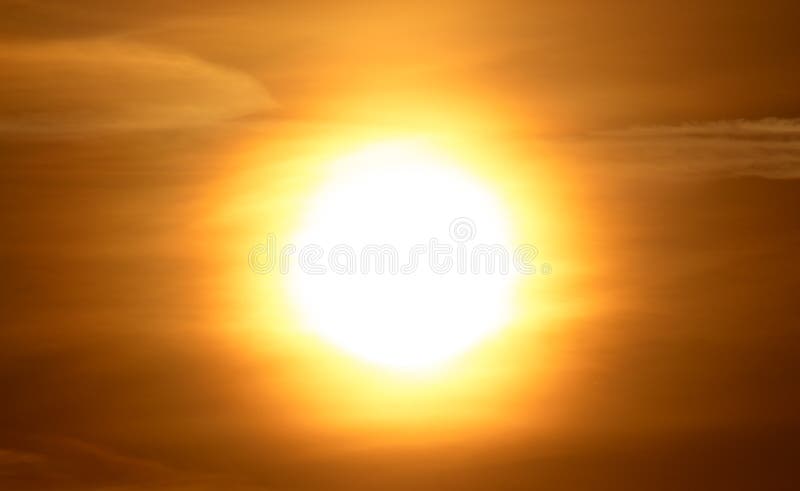 A Large Bright Sun with Rays in the Sky Stock Photo - Image of ...