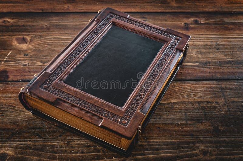 Large Brown Leather Book Lay Down To Wooden Table Stock Image - Image ...