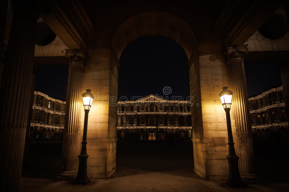 A Large Building with a Large Archway in the Middle Stock Photo - Image ...