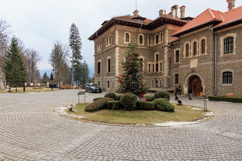 Large Building with a Christmas Tree in Front of it. December 15, 2024 ...