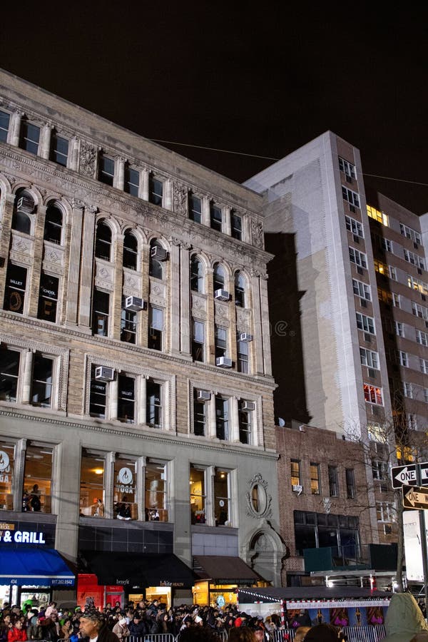 A Large Building with a Clock on the Front of it Editorial Photography ...