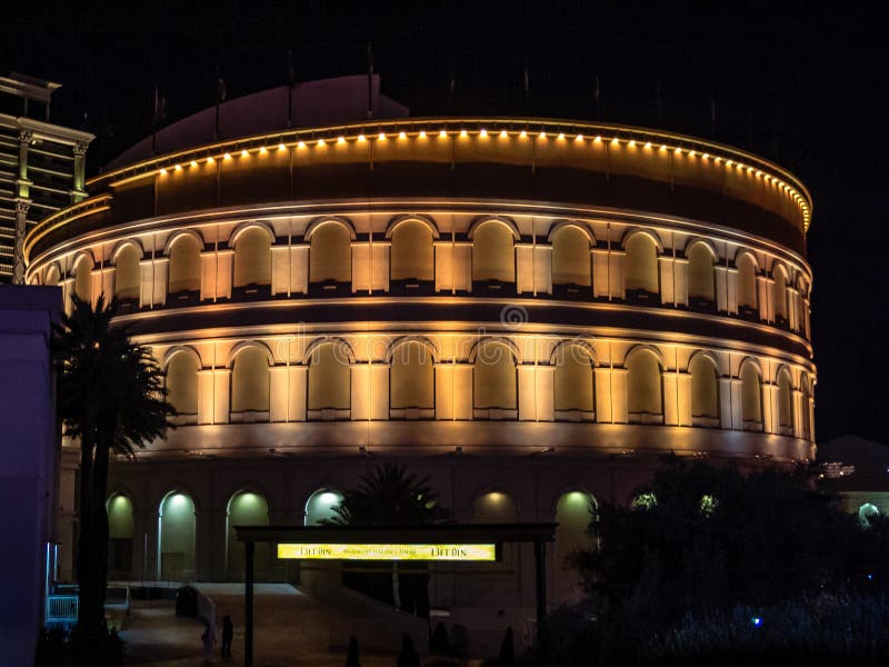 A Large Building with a Dome on Top is Lit Up at Night Stock Photo ...
