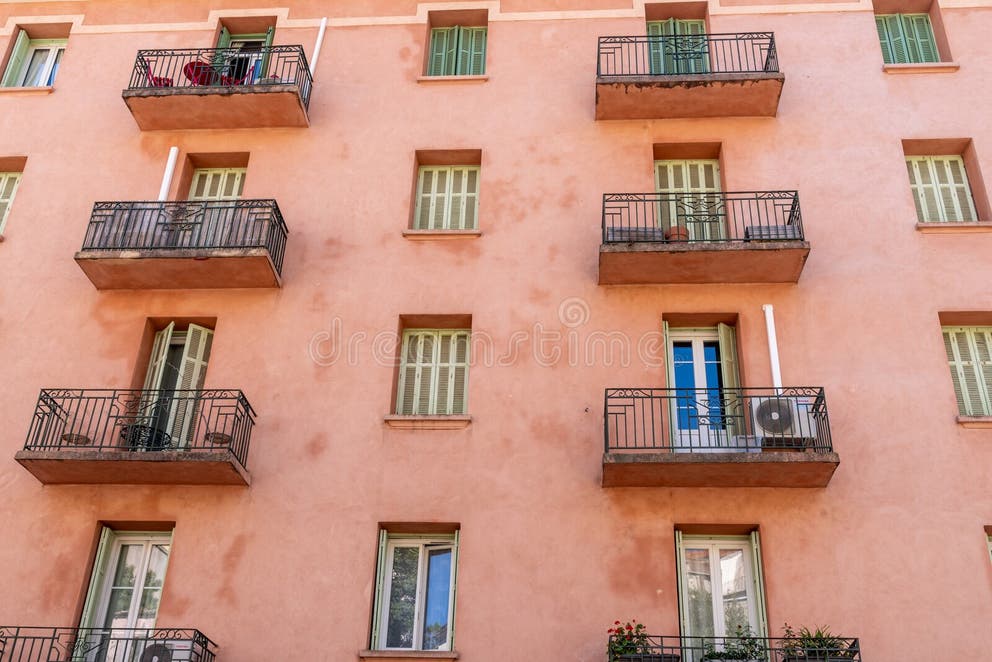 A Large Building that Has Numerous Windows and Multiple Balconies Stock ...
