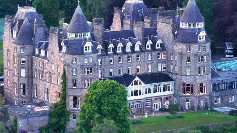 A Large Building with a Lot of Windows and a Tower Stock Video - Video ...