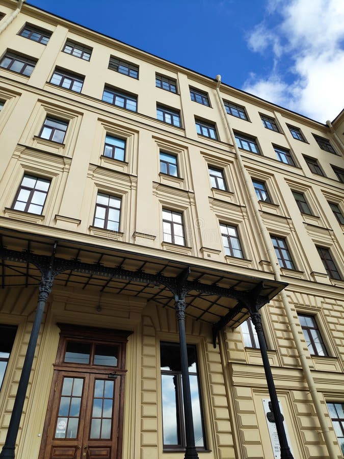 Large Building with Many Windows and a Balcony Stock Image - Image of ...