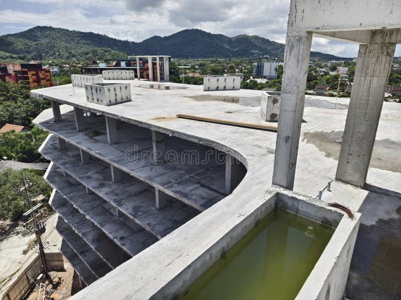 Large Building with a Roof Pool of Water Under Construction Stock Image ...