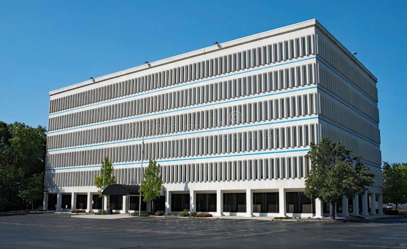 Large Building with Rows of Narrow Windows Stock Photo - Image of ...