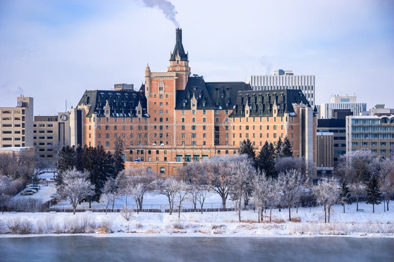 A Large Building with a Tall Tower and a Chimney Stock Image - Image of ...