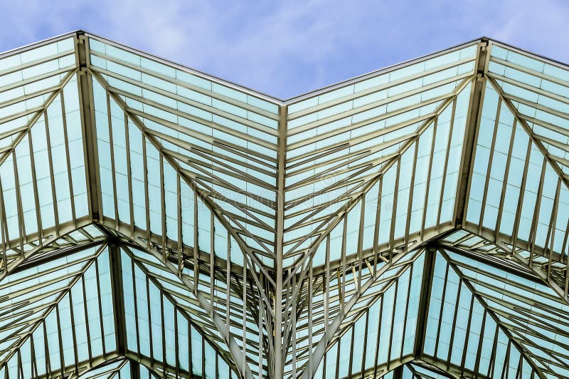 A Large Building with a Unique Roof Design Stock Photo - Image of large ...