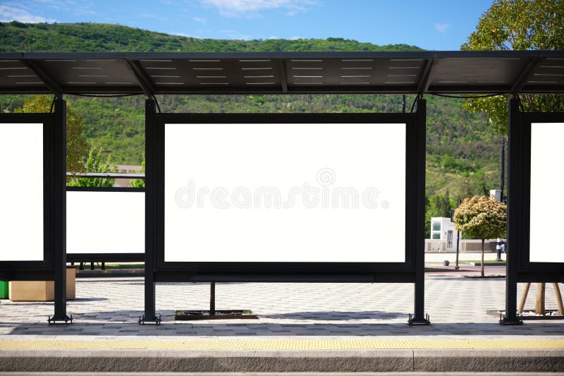 A Large Bus Stop Against the Backdrop of the Mountains with Empty ...