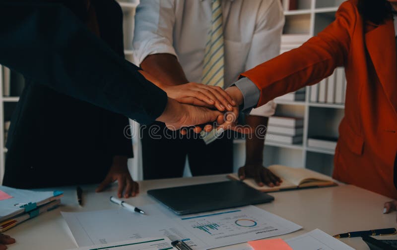 Large Business Team Showing Unity with Their Hands Together Stock Image ...