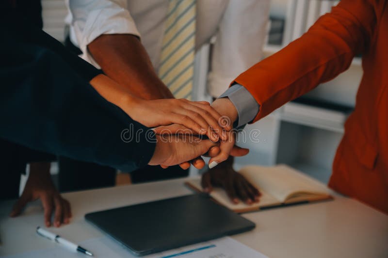 Large Business Team Showing Unity with Their Hands Together Stock Image ...