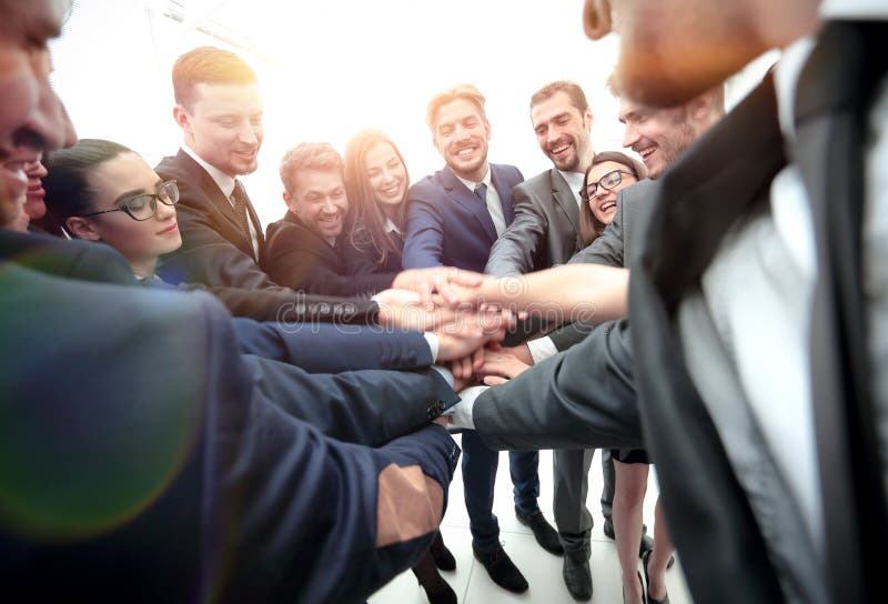 Large Business Team Showing Unity with Their Hands Together Stock Image ...