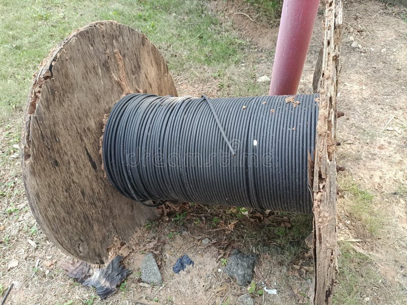 The Large Cable Reel Made of Wood Stock Image - Image of tree, grass ...