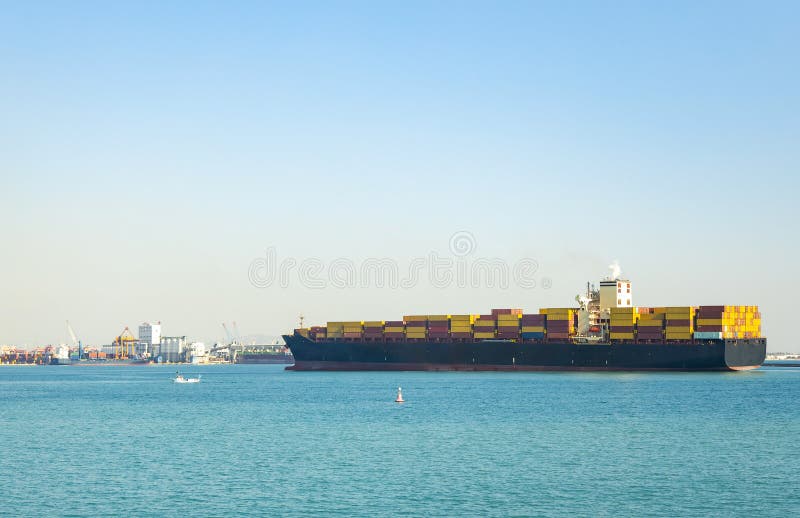 Large Cargo Container Ship Sails in the Seaport Stock Photo - Image of ...
