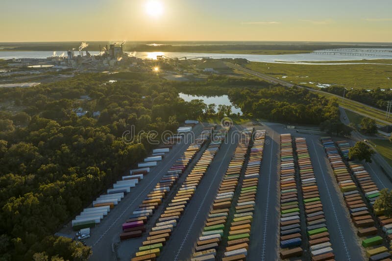 Large Cargo Container Yard with Many Freight Containers and Big Factory ...