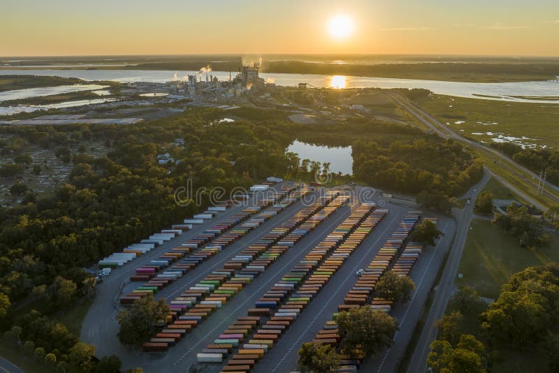 Large Cargo Container Yard with Many Freight Containers and Big Factory ...