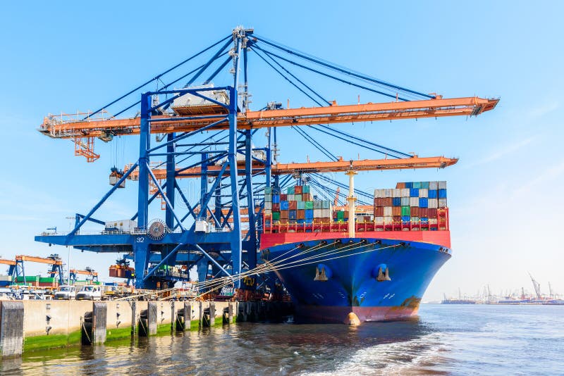 Large Cargo Ship Being Loaded with Containers in a Port Stock Photo ...