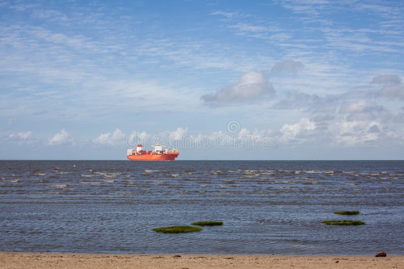 Large Cargo Ship on the North Sea in Germany. View from the Beach Stock ...