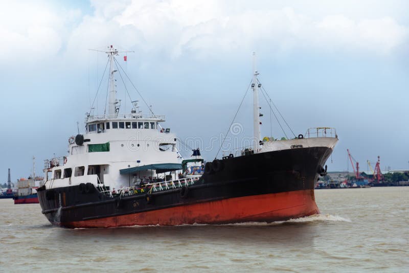 Large Cargo Ships. it is Moving through the Water Waves and Head Stock ...
