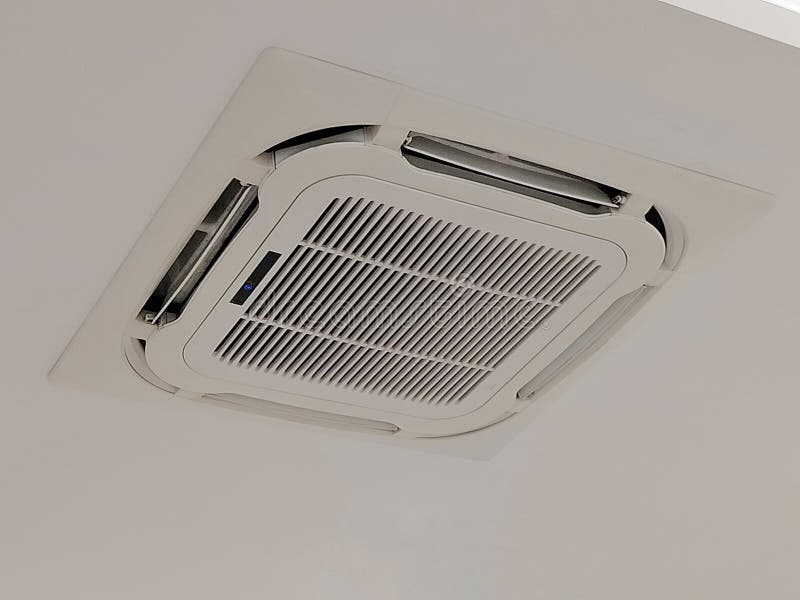 A Large Cassette Type Air Conditioner is Installed on the Ceiling Stock ...