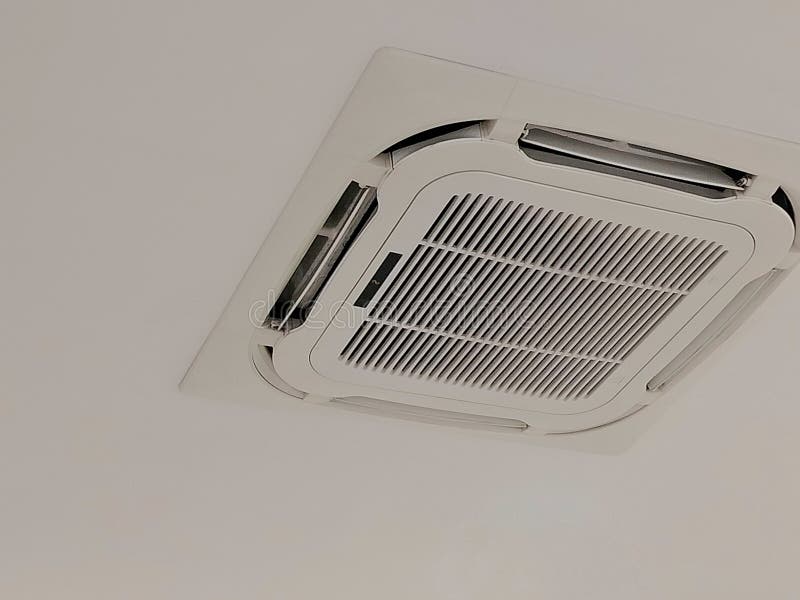 A Large Cassette Type Air Conditioner is Installed on the Ceiling Stock ...