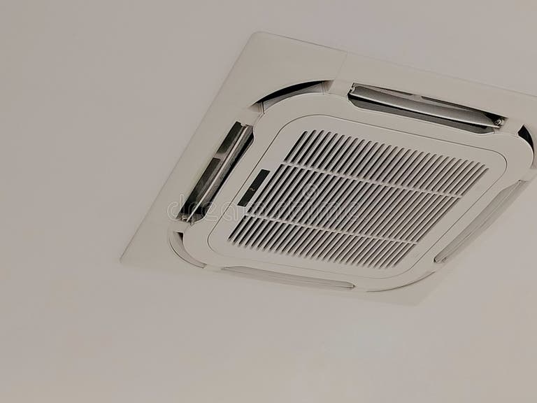 A Large Cassette Type Air Conditioner is Installed on the Ceiling Stock ...