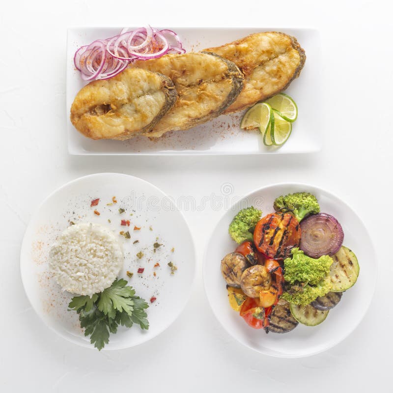 Large Chunks of Fried Fish - Pike Perch with Red Onion and Lime in a ...