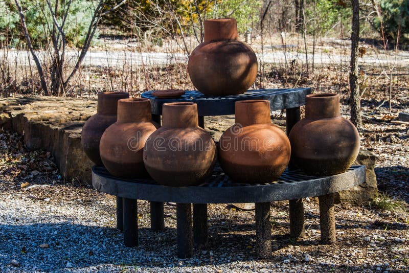 Large clay pots on a stand stock photo. Image of garden - 127052644
