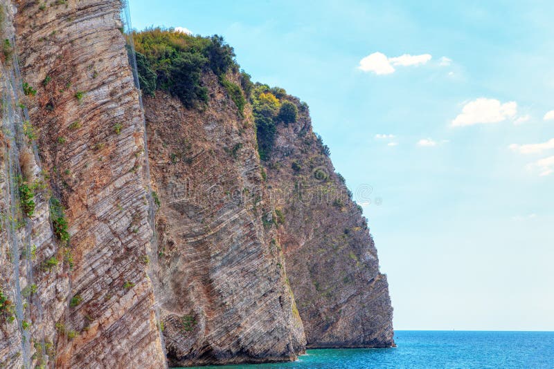 Large cliffs in the sea stock image. Image of island - 175848823