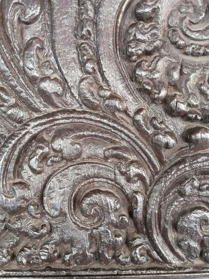 A Large Clock with a Unique Shape Made of Teak Wood Stock Image - Image ...