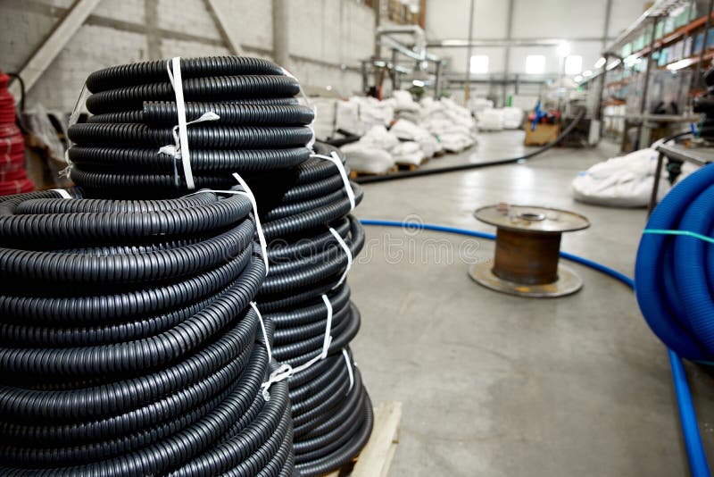 Large Coils of Black Corrugated Pipe at the Factory Stock Image - Image ...