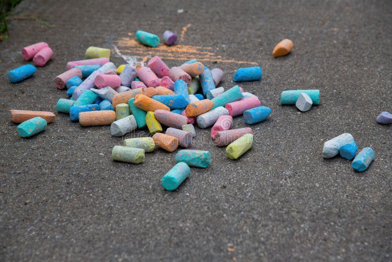 Crayons on a pavement stock photo. Image of colorful - 250835766