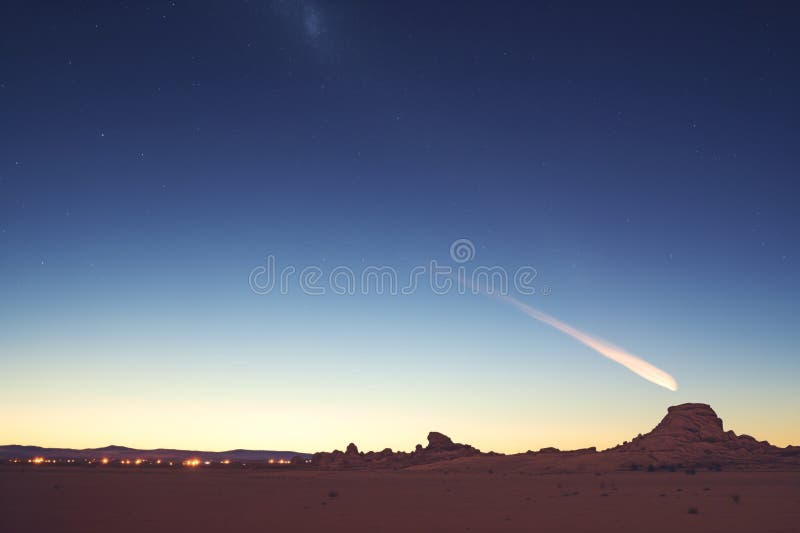 Large Comet Passing Over a Desolate Desert Terrain at Night Stock Photo ... Large Comet Passing Over a Desolate Desert Terrain at Night Stock Photo ...