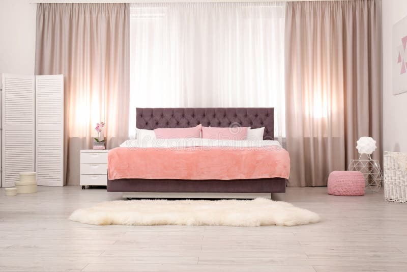 Large Comfortable Bed in Stylish Room. Apartment Interior Stock Image ...