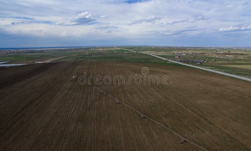 Field Sprinkler on Empty Crop Field Stock Image - Image of ...