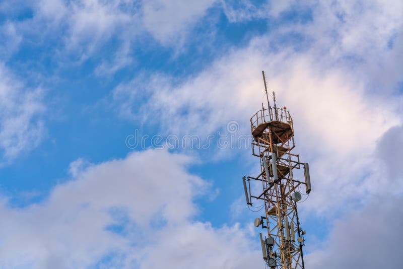Large Communications Tower on a Blue Sky Stock Photo - Image of ...