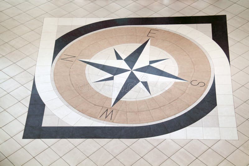 Large compass on floor stock photo. Image of direction - 42649500