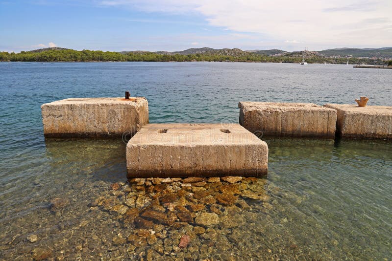 Large Concrete Blocks in the Sea Stock Image - Image of shore ...