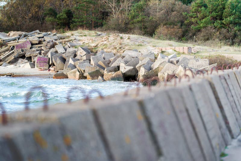 Large concrete breakwaters stock image. Image of structure - 130148431