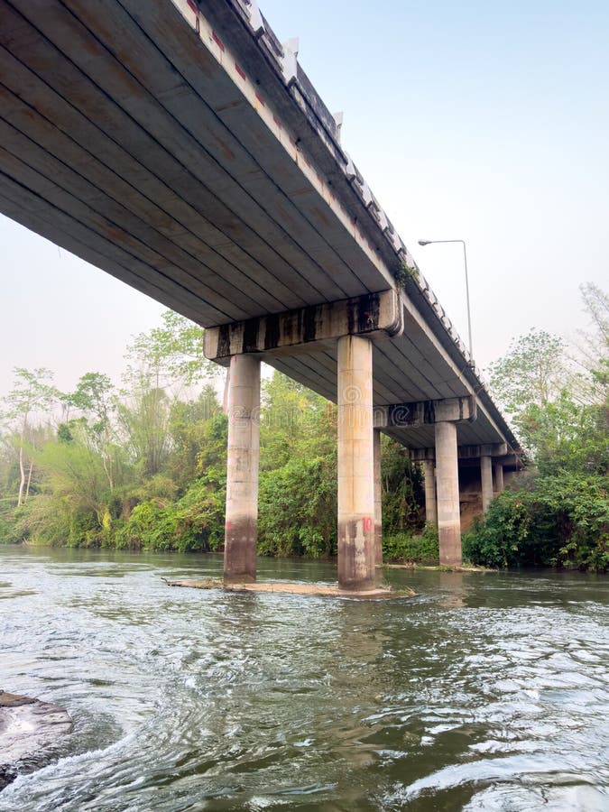 Large Concrete Bridge Over the River. View from Below Stock Image ...
