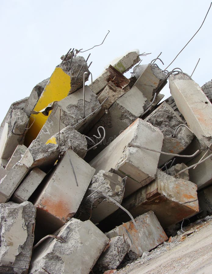 Large Concrete Chunks with Twisted Metal on a Demolition Site Stock ...
