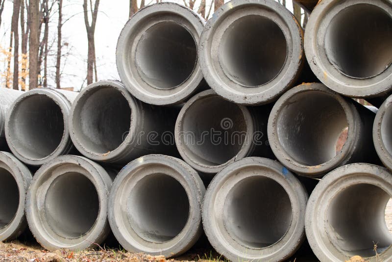 Large concrete sewer pipes stock photo. Image of manufacturing - 267364058