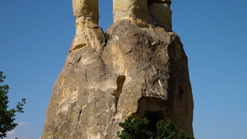 A Large Cone-shaped Rock Structure with Erect Top Structures Stock ...