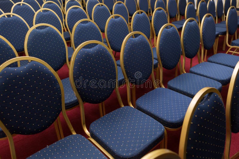 A Large Conference Hall with Elite Blue Seats, Comfortable Chairs, Many ...