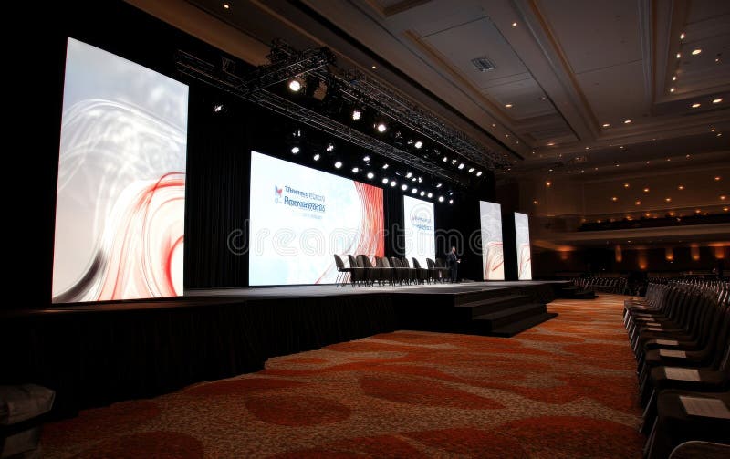 Large Conference Hall Stage Setup with Abstract Screen Displays Stock ...
