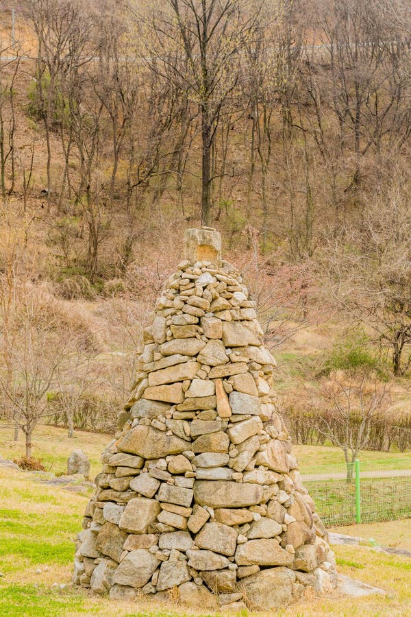 Large Conical Tower of Stack Stones Stock Photo - Image of balancing ...