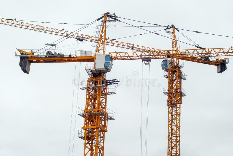 Large Construction Crane Builds a House Stock Photo - Image of city ...