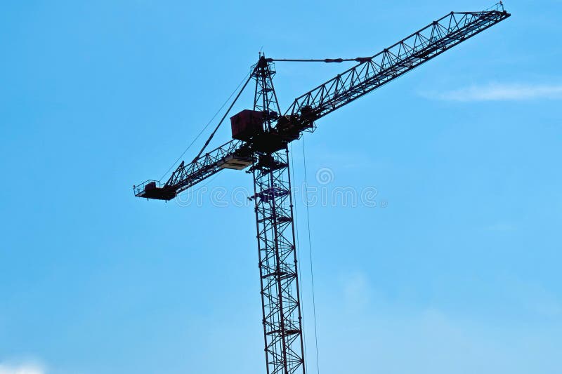 Large Construction High Rise Crane and Clear Blue Sky Stock Image ...