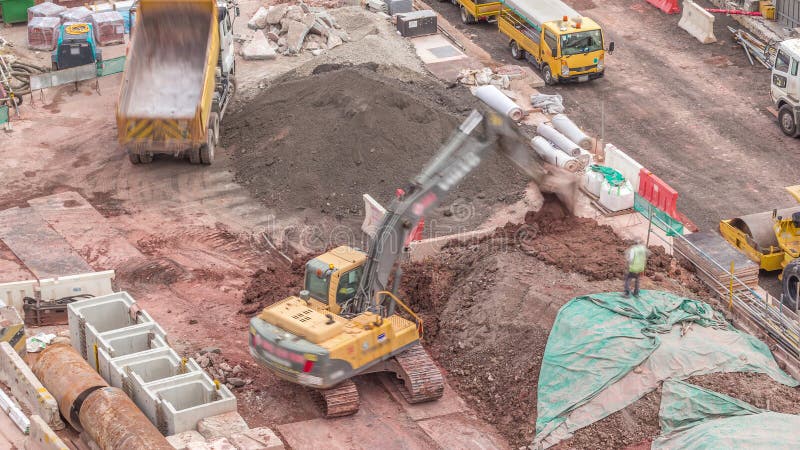 A Large Construction Site in the City Timelapse with Heavy Vehicle at ...